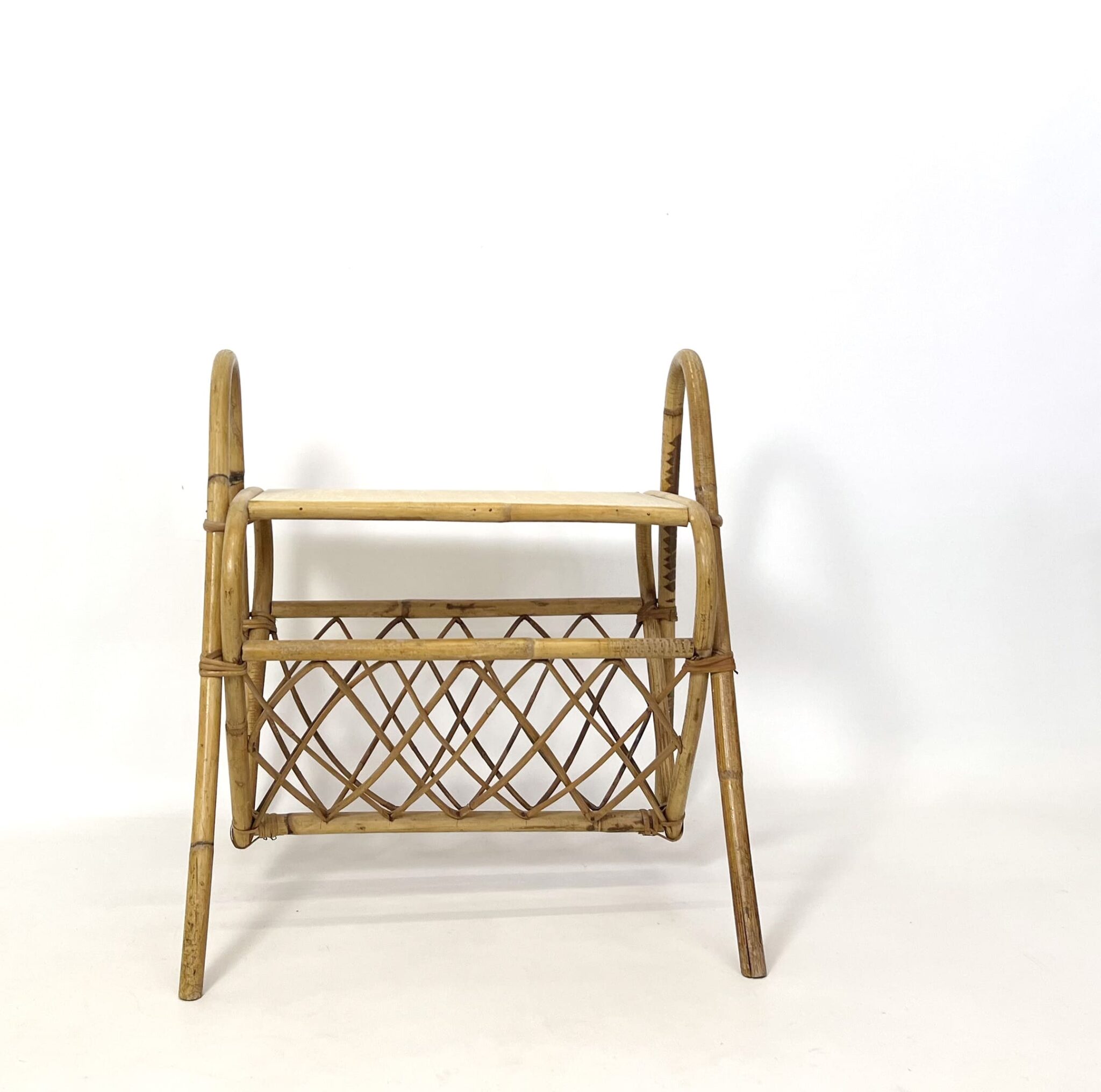 French rattan bedside table from the 1960’s-1970’s. — LampAndCo