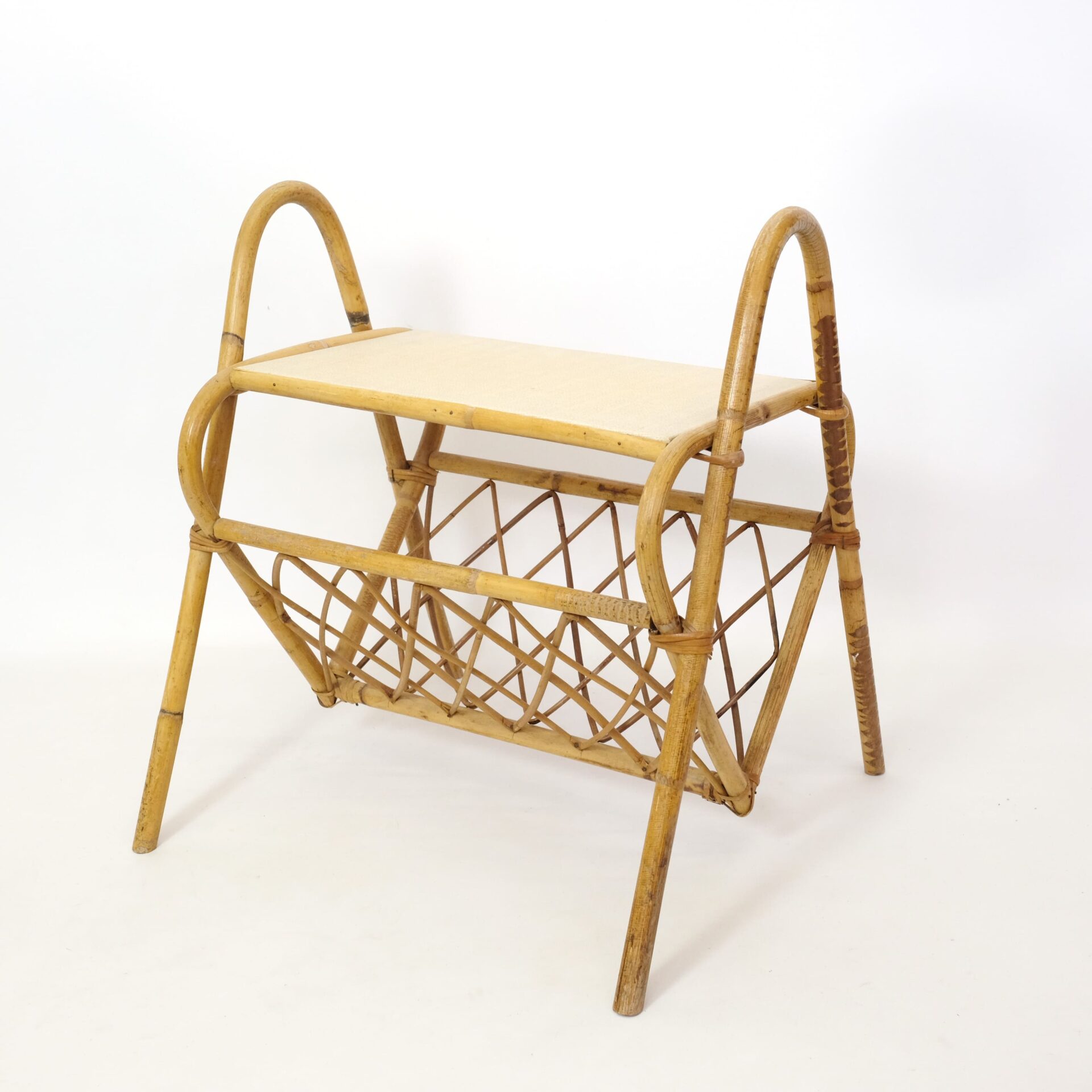 French rattan bedside table from the 1960’s-1970’s. — LampAndCo