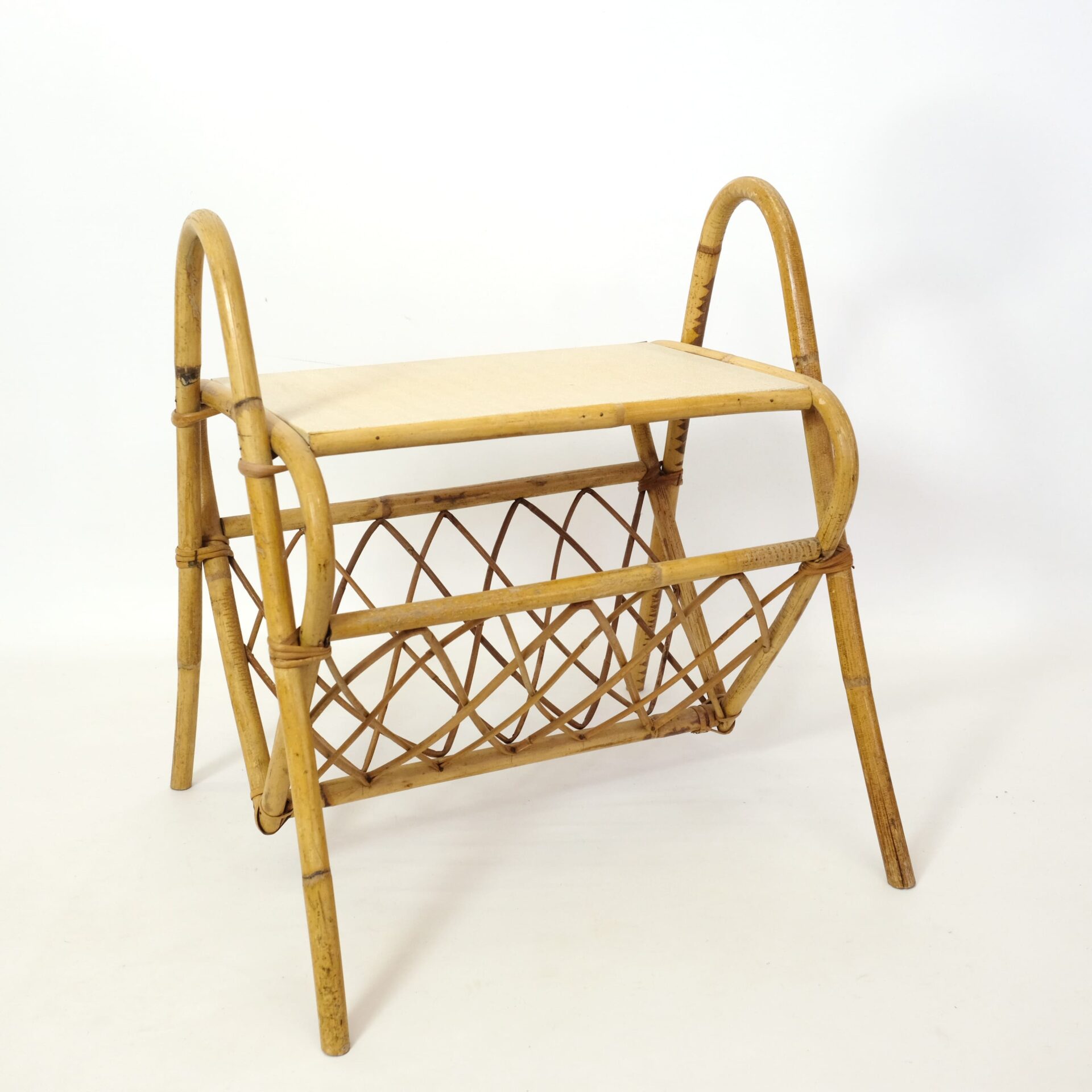French rattan bedside table from the 1960’s-1970’s. — LampAndCo