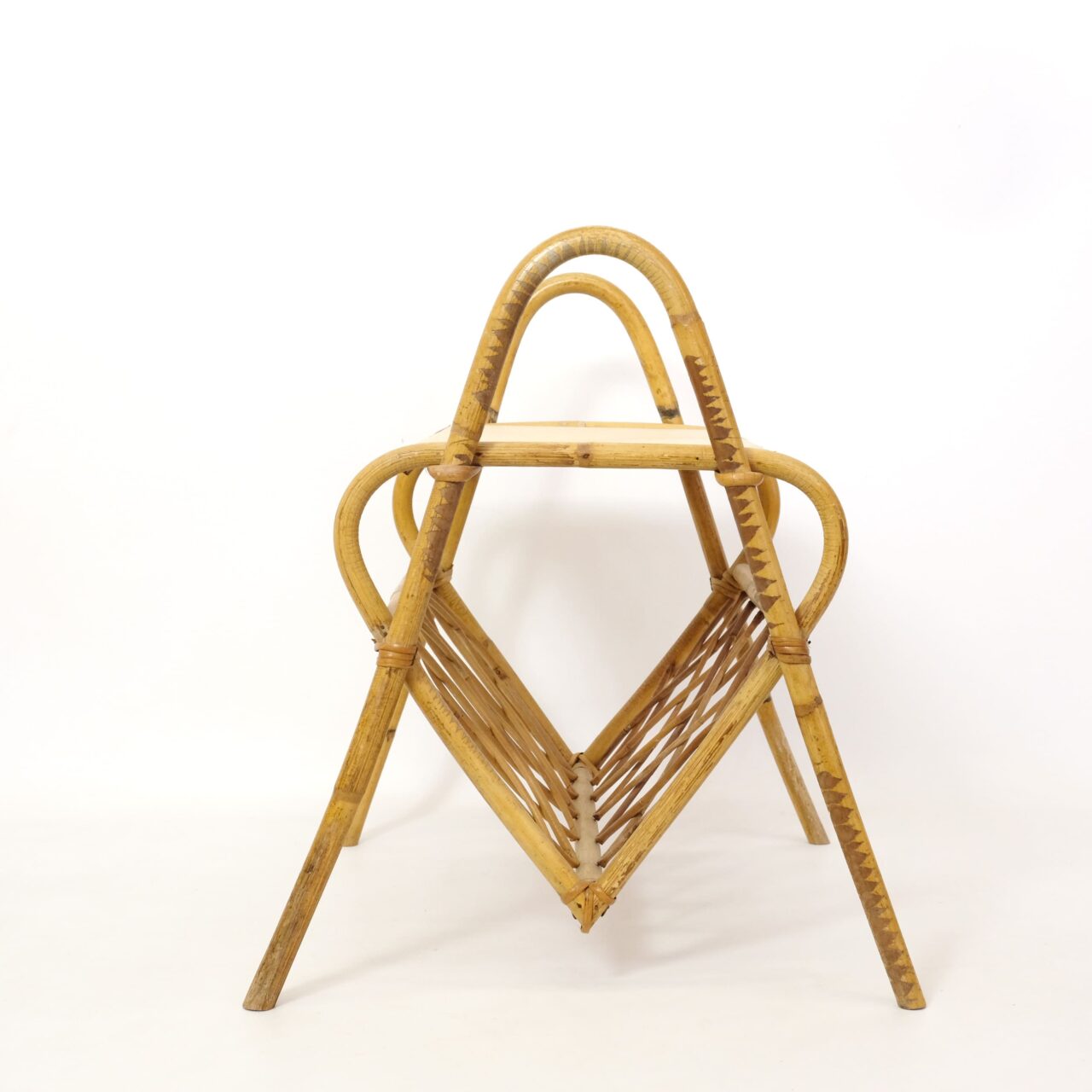 French rattan bedside table from the 1960’s-1970’s. — LampAndCo